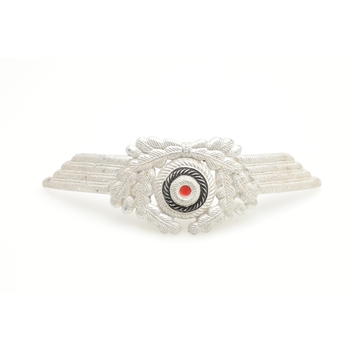 TWO SIMILAR LUFTWAFFE N.C.O.'S PEAKED CAP WING BADGES. Two similar ...