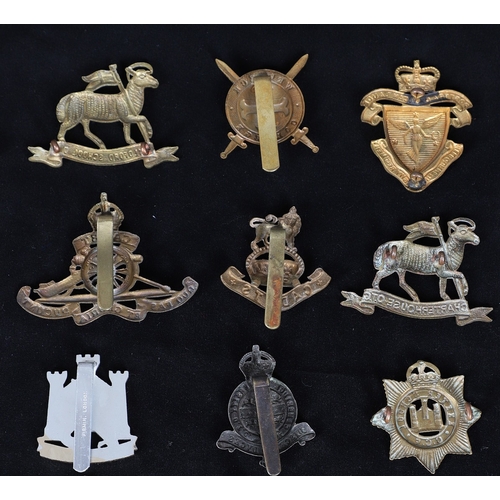 A COLLECTION OF MILITARY CAP BADGES FOR OFFICER TRAINING CORPS AND ...