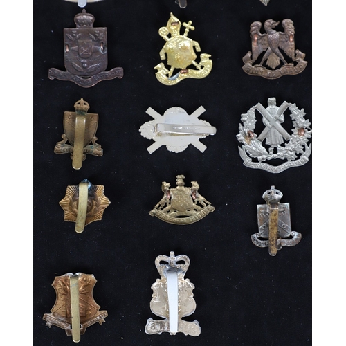 A COLLECTION OF MILITARY CAP BADGES FOR OFFICER TRAINING CORPS AND ...
