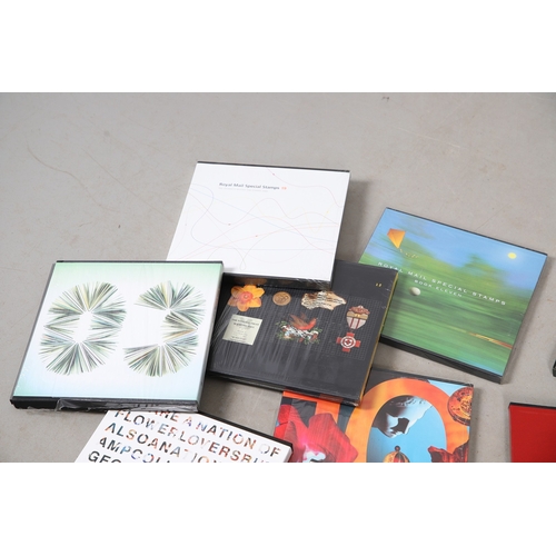 ROYAL MAIL SPECIAL STAMP YEAR PRESENTATION PACKS. A large qty of ...