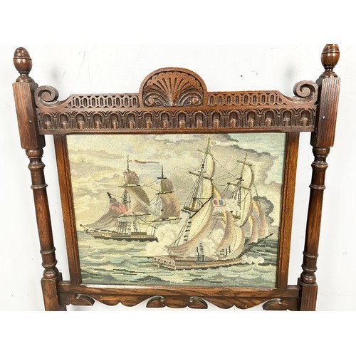 CARVED OAK FIRE SCREEN WITH TAPESTRY OF SAILING SHIPS WIDTH 84cm