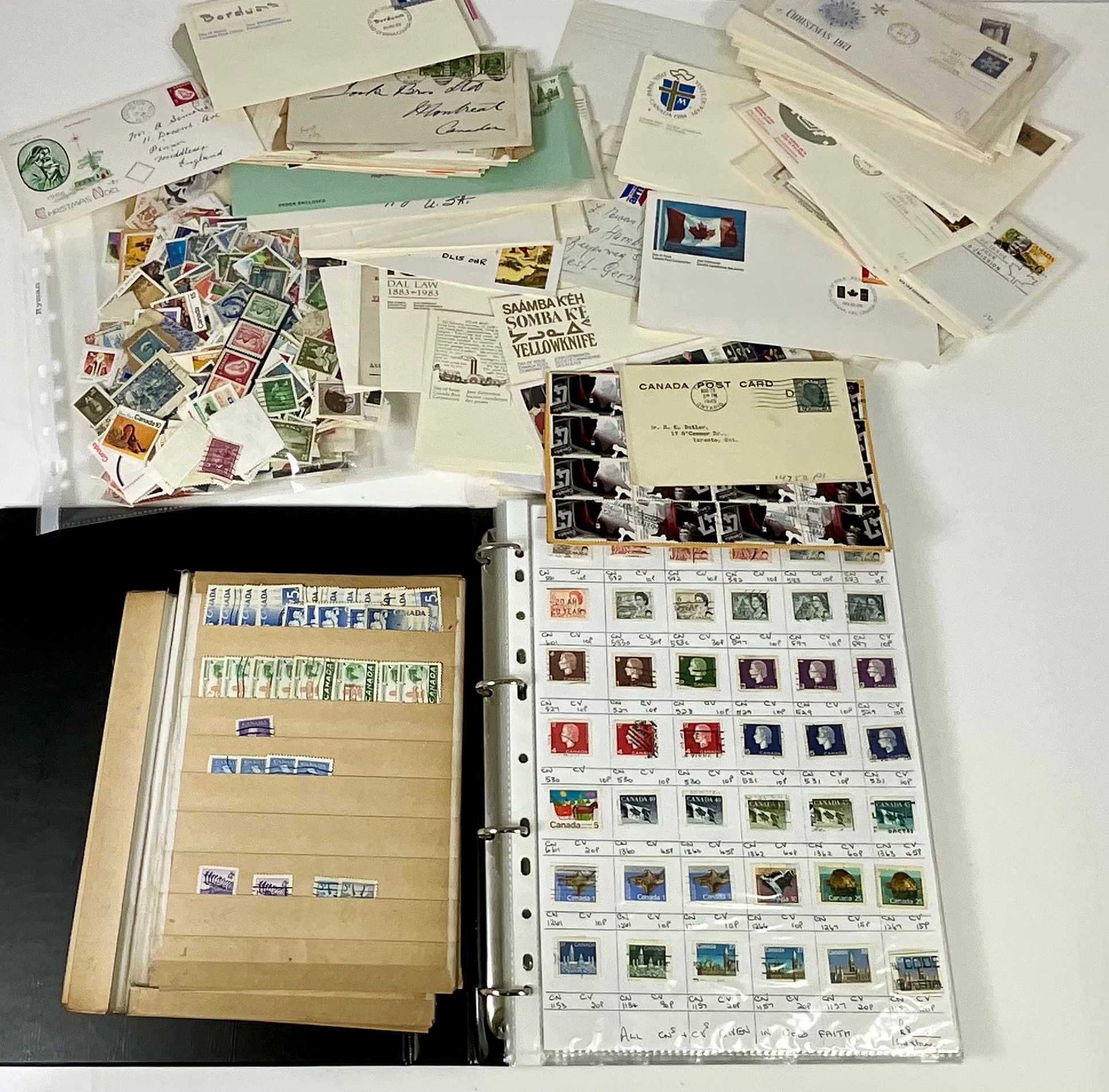 STAMP INTEREST, AN ALBUM OF USED CANADA STAMPS, PLUS QTY OF ON & OFF PAPER