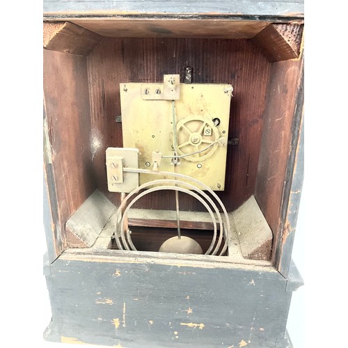 AN AESTHETIC MOVEMENT EBONISED MANTEL CLOCK IN THE MANNER OF LEWIS ...