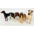 FOUR BESWICK DOG MODELS INCLUDING ST BERNARD, AFGHAN HOUND, DOBERMAN ...