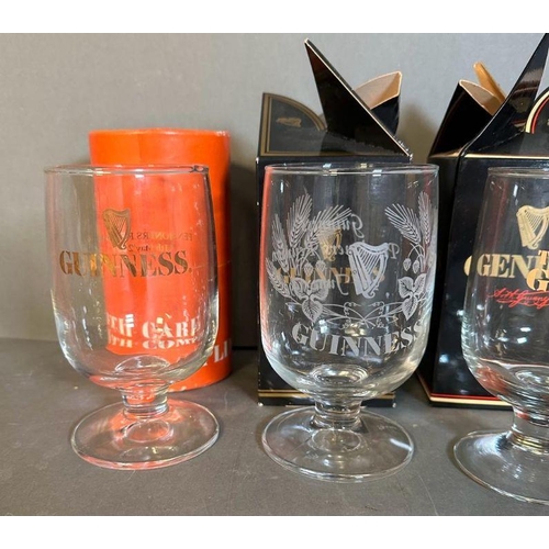 Five boxed commemorative Guinness glasses to include John Gilroy ...