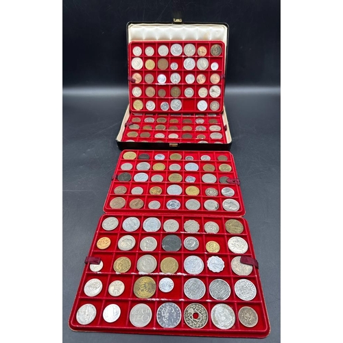 A coin collectors box with four trays of worldwide coins, various ...