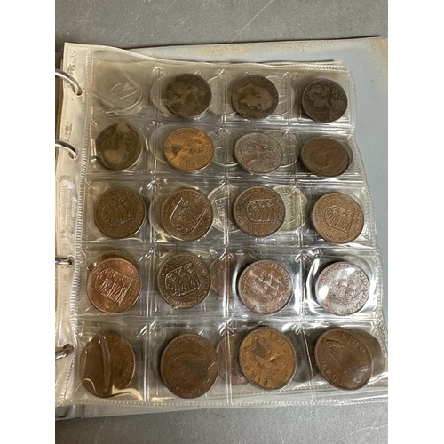An album of collectable Great British coins to include: Half Pennies ...