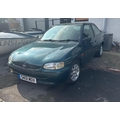 A green Ford Escort Finesse three door hatchback, petrol, key and VS ...