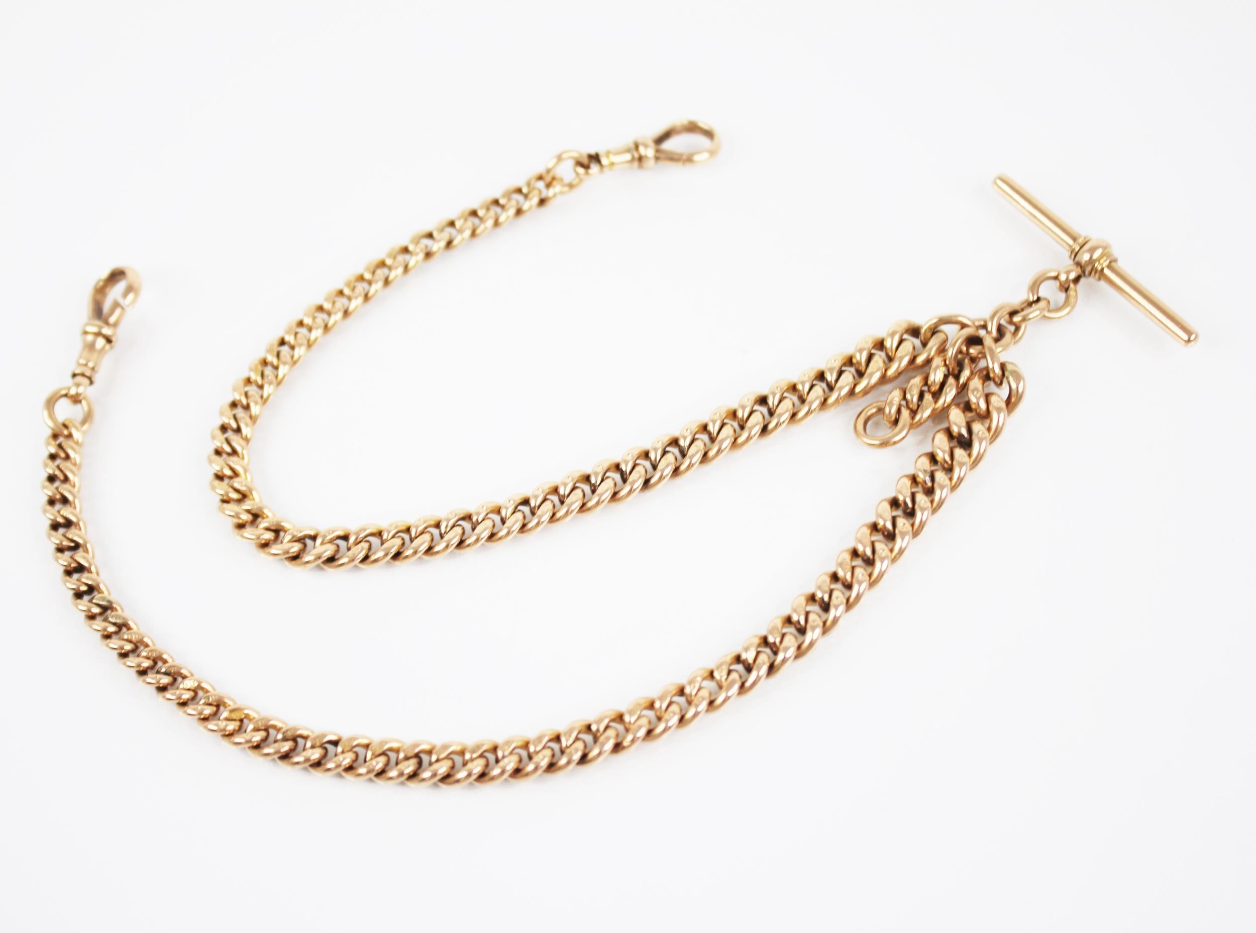A 9ct yellow gold double albert chain, the graduated curb link chain ...
