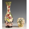 A Moorcroft vase, 20th century, in the 'Golden Lily' pattern, of ovoid ...