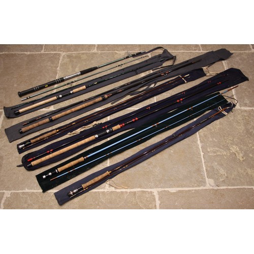 A selection of fishing rods, to include: a Shakespeare Carbo 'Feather ...