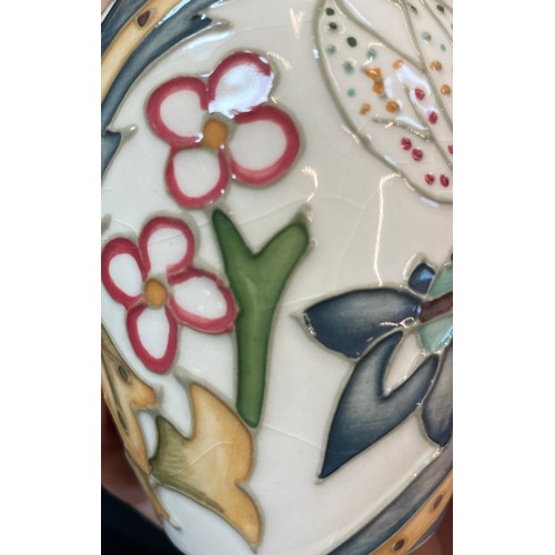 A Moorcroft vase, 20th century, in the 'Golden Lily' pattern, of ovoid ...