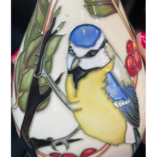 A Moorcroft vase, 20th century, in the 'Golden Lily' pattern, of ovoid ...