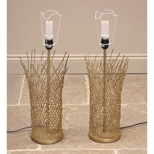 A pair of contemporary gilt metal table lamps, formed as naturalistic ...