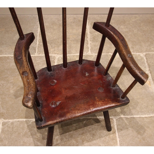 A primitive stained ash comb back chair, probably West Country, late ...