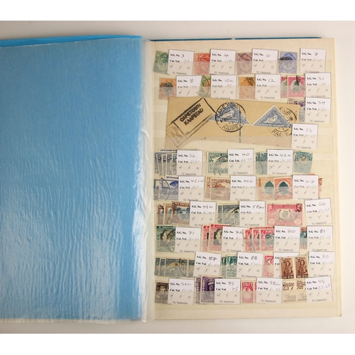 A large quantity of mint and used stamps in dealer stock books, Great ...