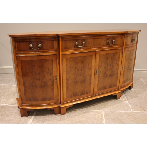 A Bevan Funnell Reprodux Regency style yew wood bowfront sideboard ...