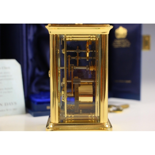 A Halcyon Days Enamels lacquered brass eight day carriage clock, the ...