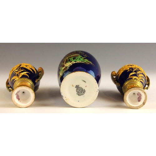 A pair of Royal Worcester porcelain twin handled stem vases, late 19th ...