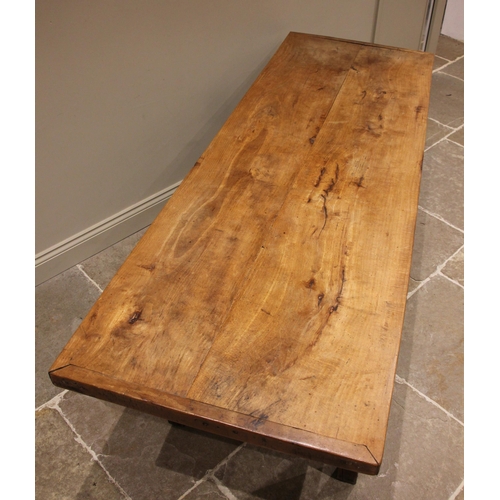 A 19th century rustic slab top kitchen/scullery table, the twin plank ...