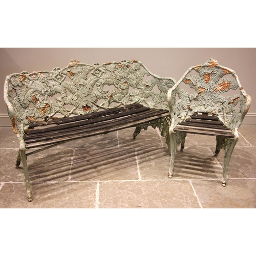 A Victorian cast iron fern pattern garden bench, probably Coalbrookdale ...