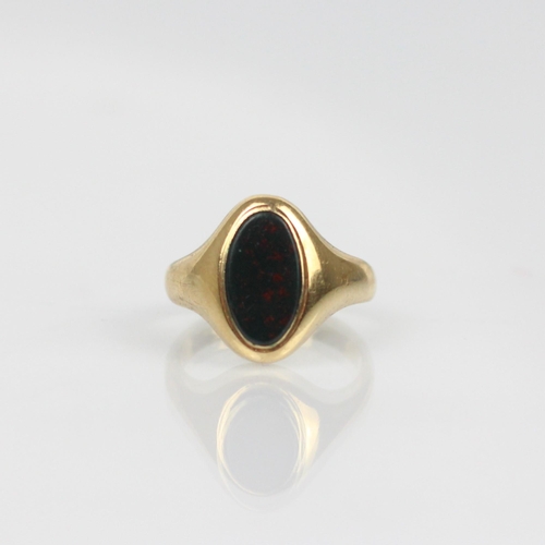 An early 20th century bloodstone signet ring, the oval bloodstone ...