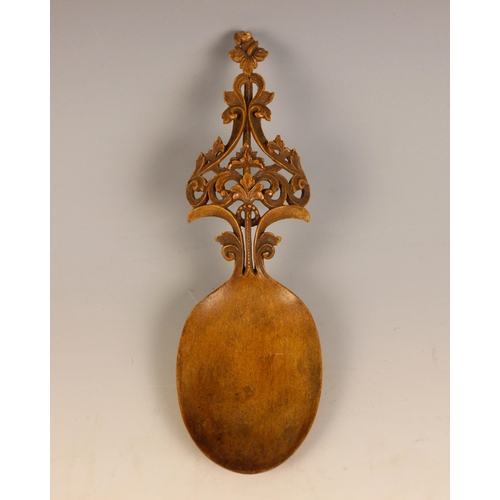 A Welsh treen folk art carved sycamore cawl spoon, 19th century, with ...