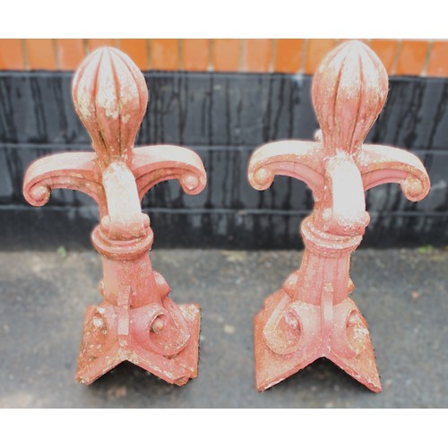 A pair of cast painted stone architectural roof balustrade finials ...