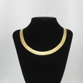 A late 20th century 9ct gold collarette, of brick link textured design ...