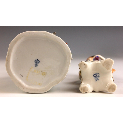 A pair of Sitzendorf porcelain figures modelled as a shepherd and ...