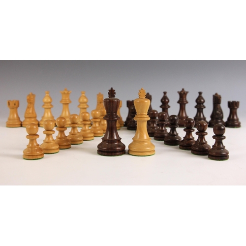 A Staunton pattern ebonised and boxwood chess set, 20th century, the ...