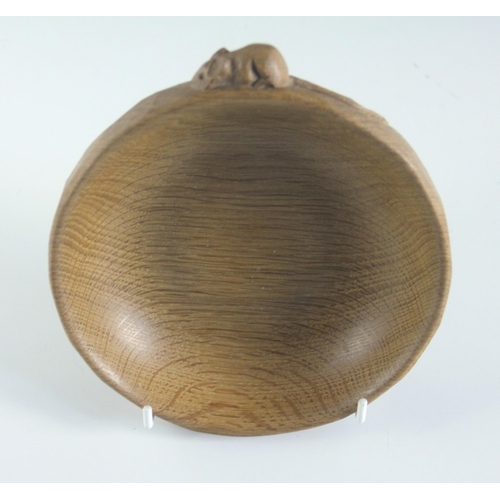 Workshop of Robert 'Mouseman' Thompson, an adzed oak nut bowl, carved ...