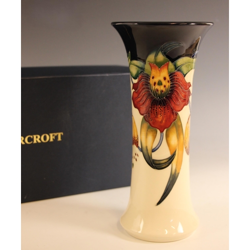 A Moorcroft 'Anna Lily' pattern vase, of trumpet form, impressed and ...