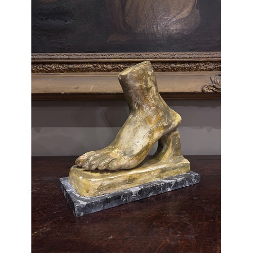 A painted plaster foot in the manner of Domenico Giovanni Brucciani ...