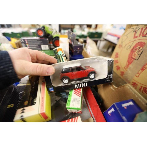 Box of model vehicles, bus, tractor, cars
