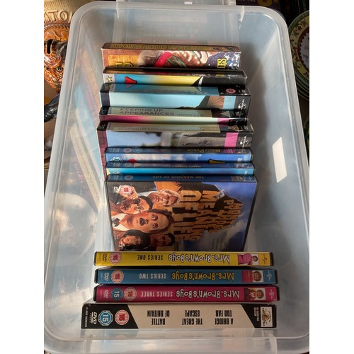 Boxes of DVDs, Blu-Rays, some sealed