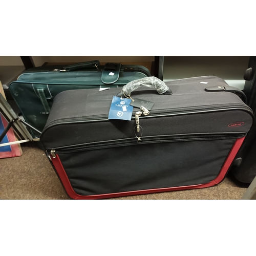 Brand new Carlton pull along suitcase with handle and wheels. Also a ...