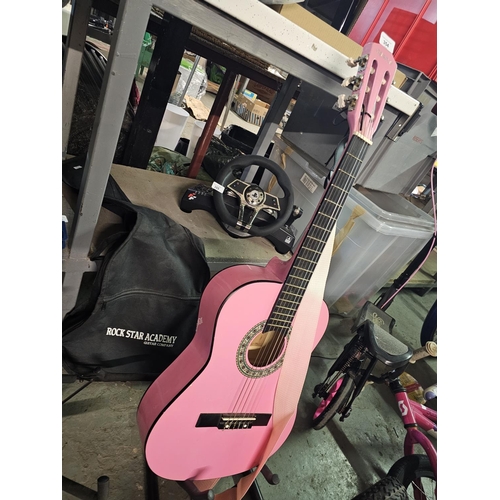 Pink Acoustic guitar and bag