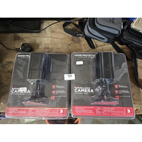 x2 surveillance cameras new in packaging