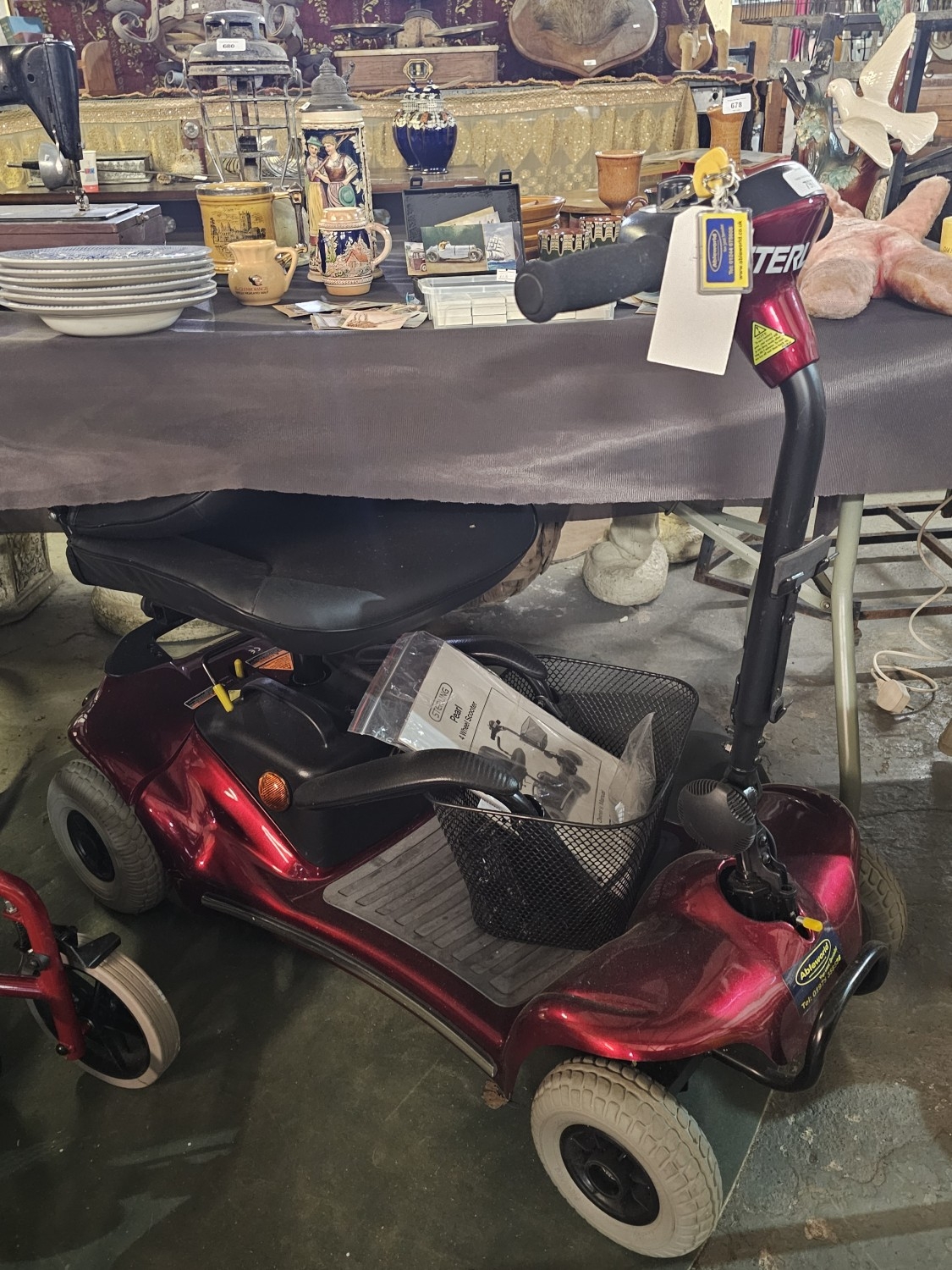 Red Motability Scooter