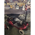 Red Motability Scooter