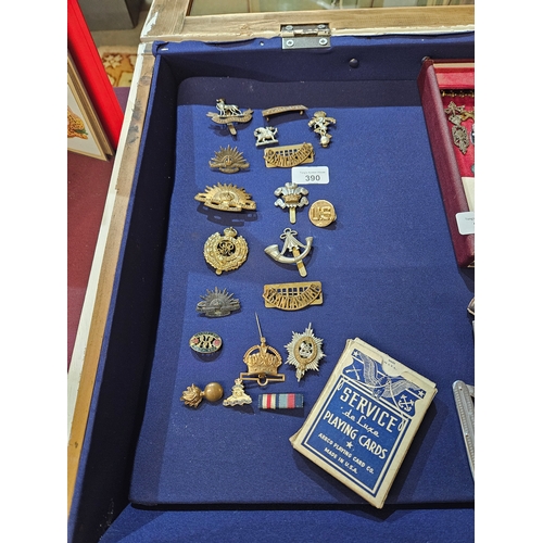 A collection of military cap badges