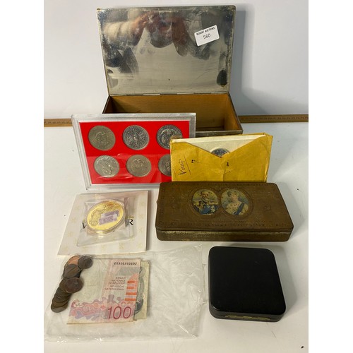Tin of old coins and banknotes, some mint sets.