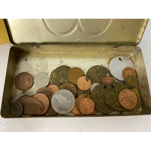 Tin of old coins and banknotes, some mint sets.