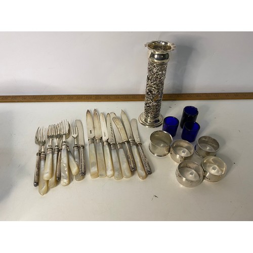 Quantity of hallmarked silverware including napkin rings, cutlery and vase.