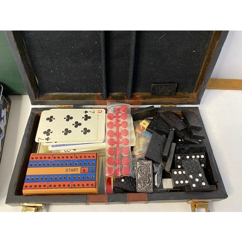 Vintage games compendium in case with snakes and ladders, dominoes and ...