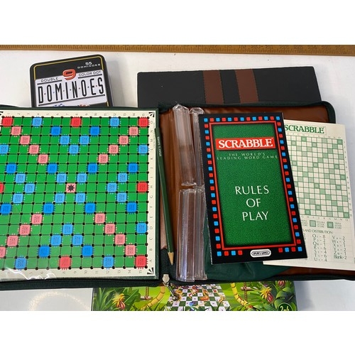 Vintage games compendium in case with snakes and ladders, dominoes and ...