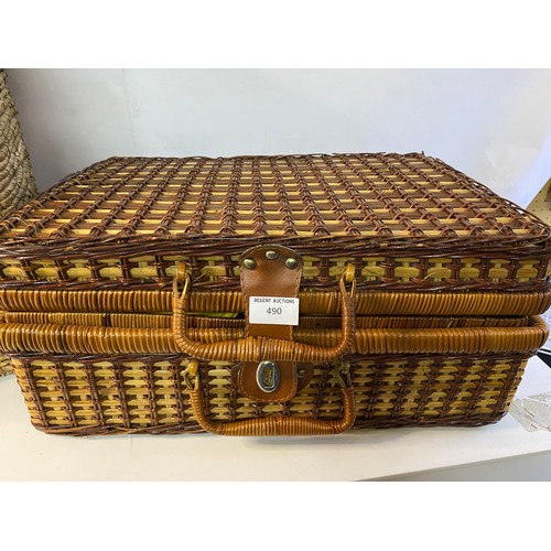 Vintage hamper basket with contents and small wicker box with lid.