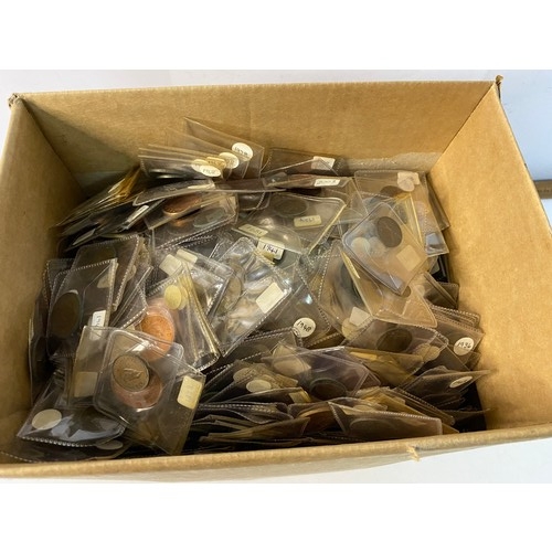 Large selection of loose coins each one in a coin pouch.