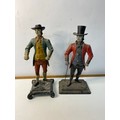 2 x vintage metal clock seller figures, one German marked PvP and one ...